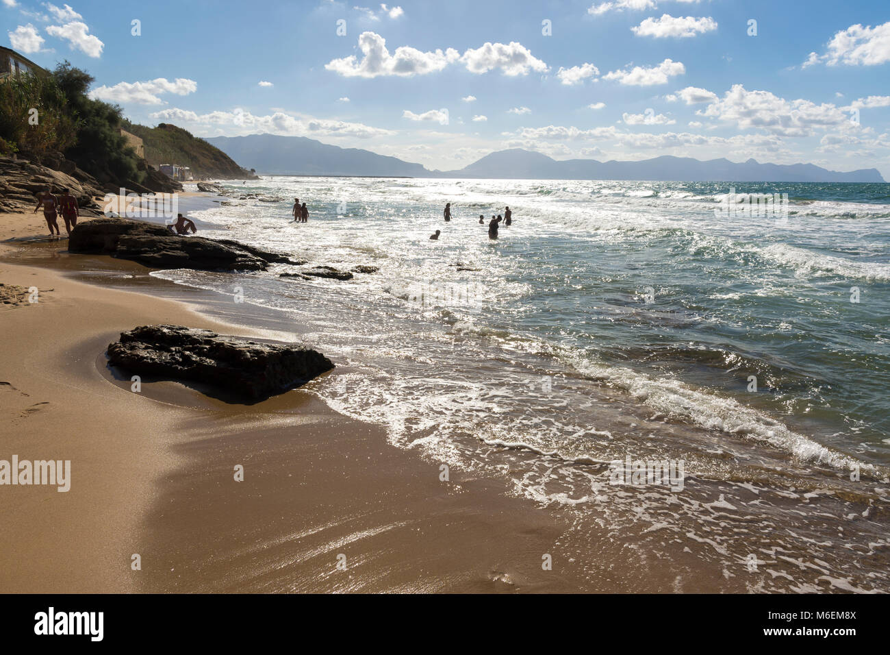 crystal clear sea and frothy waves on the beaches of Palermo in Sicily ...