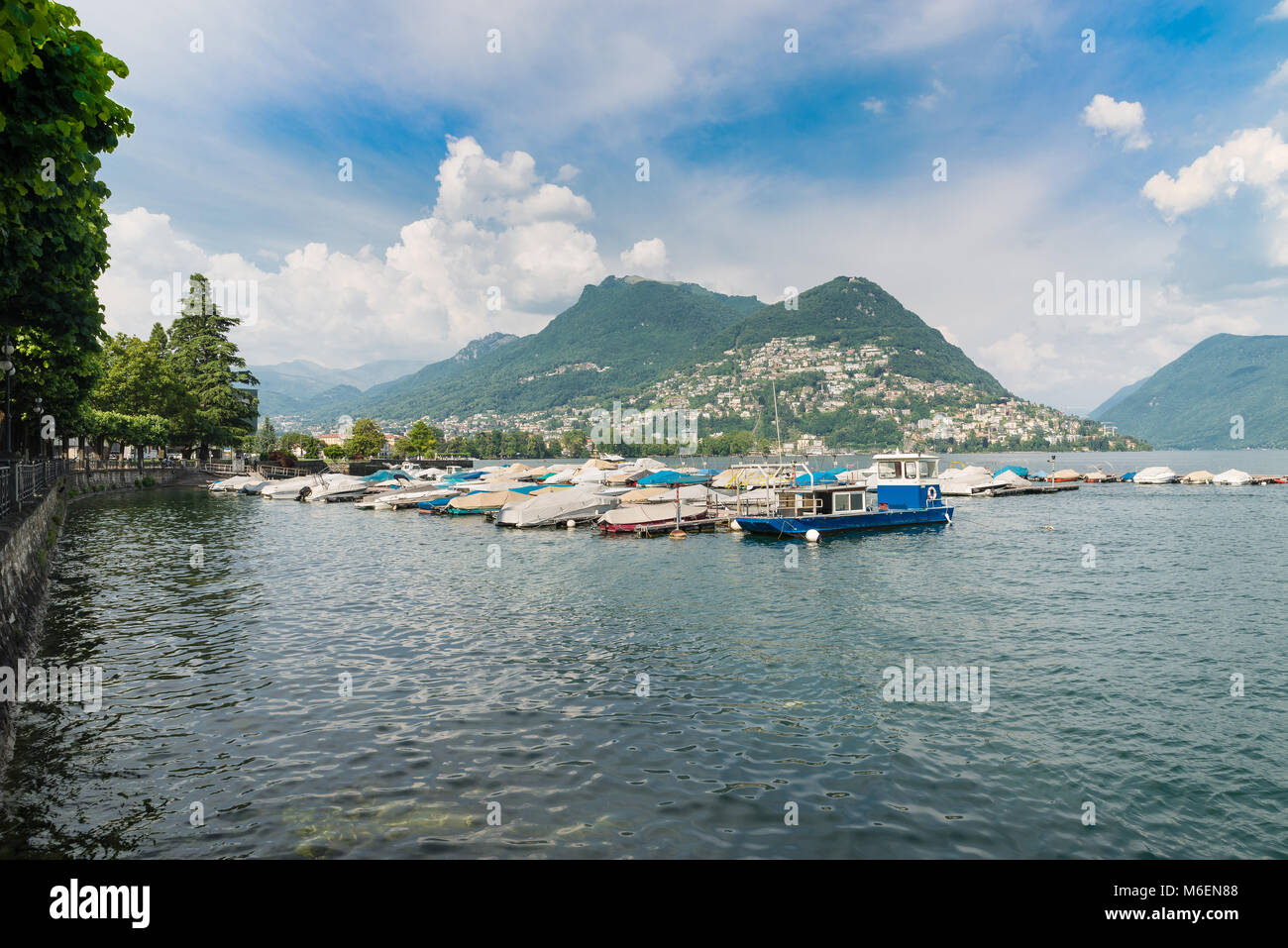 Lugano city, lake Lugano, Switzerland. Gulf of Lugano, Lugano lakeside ...