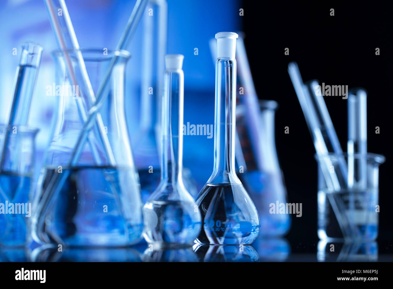 Science laboratory. Laboratory glassware, microscope, test tubes ...