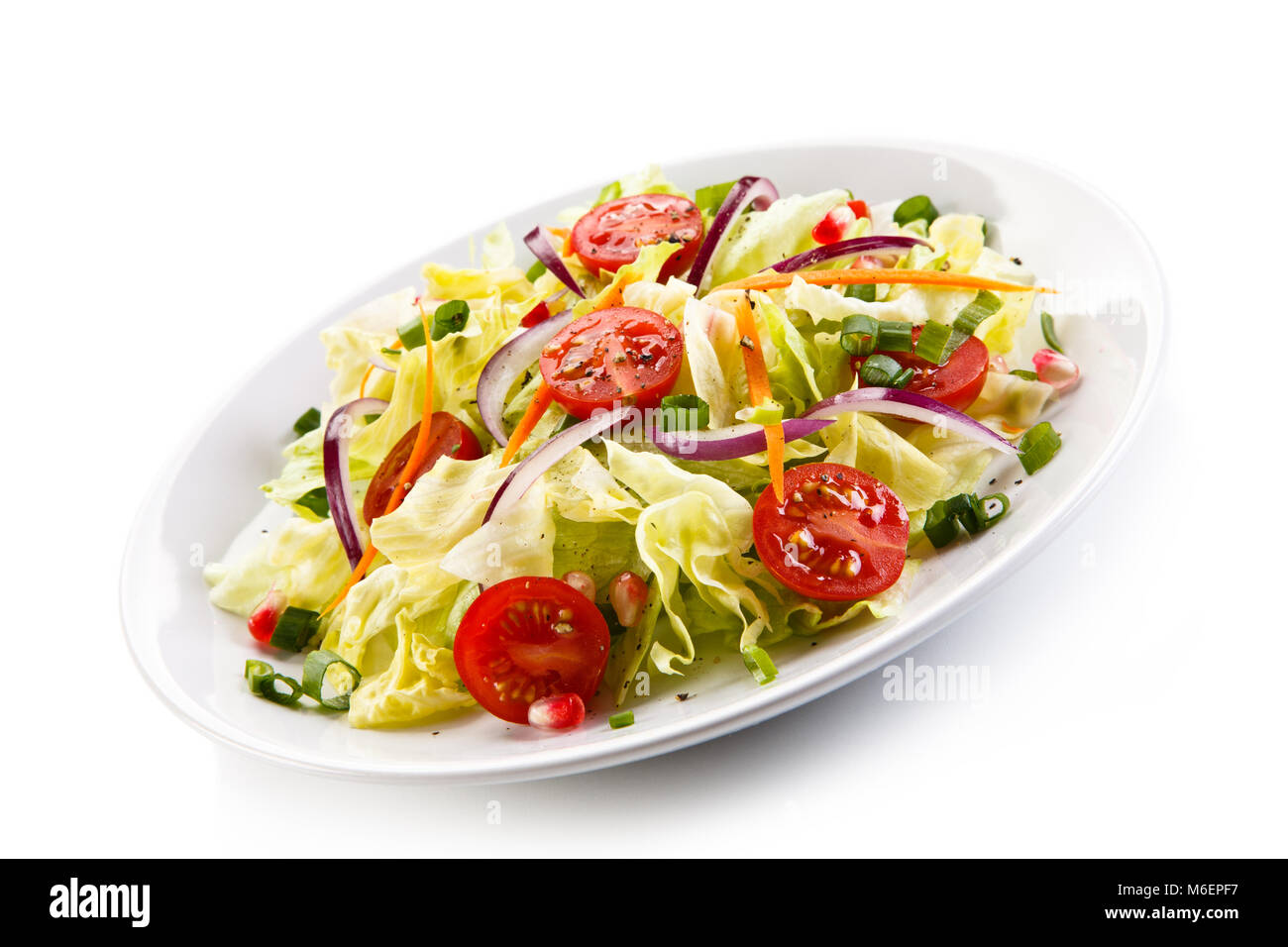Vegetable salad on white background Stock Photo - Alamy