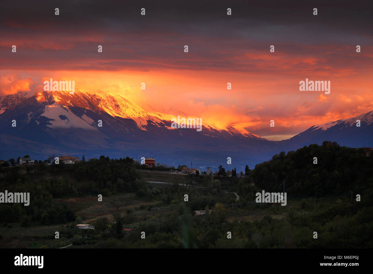 Vestea, Italy. View of the snow-capped Maiella mountains at sundown in ...