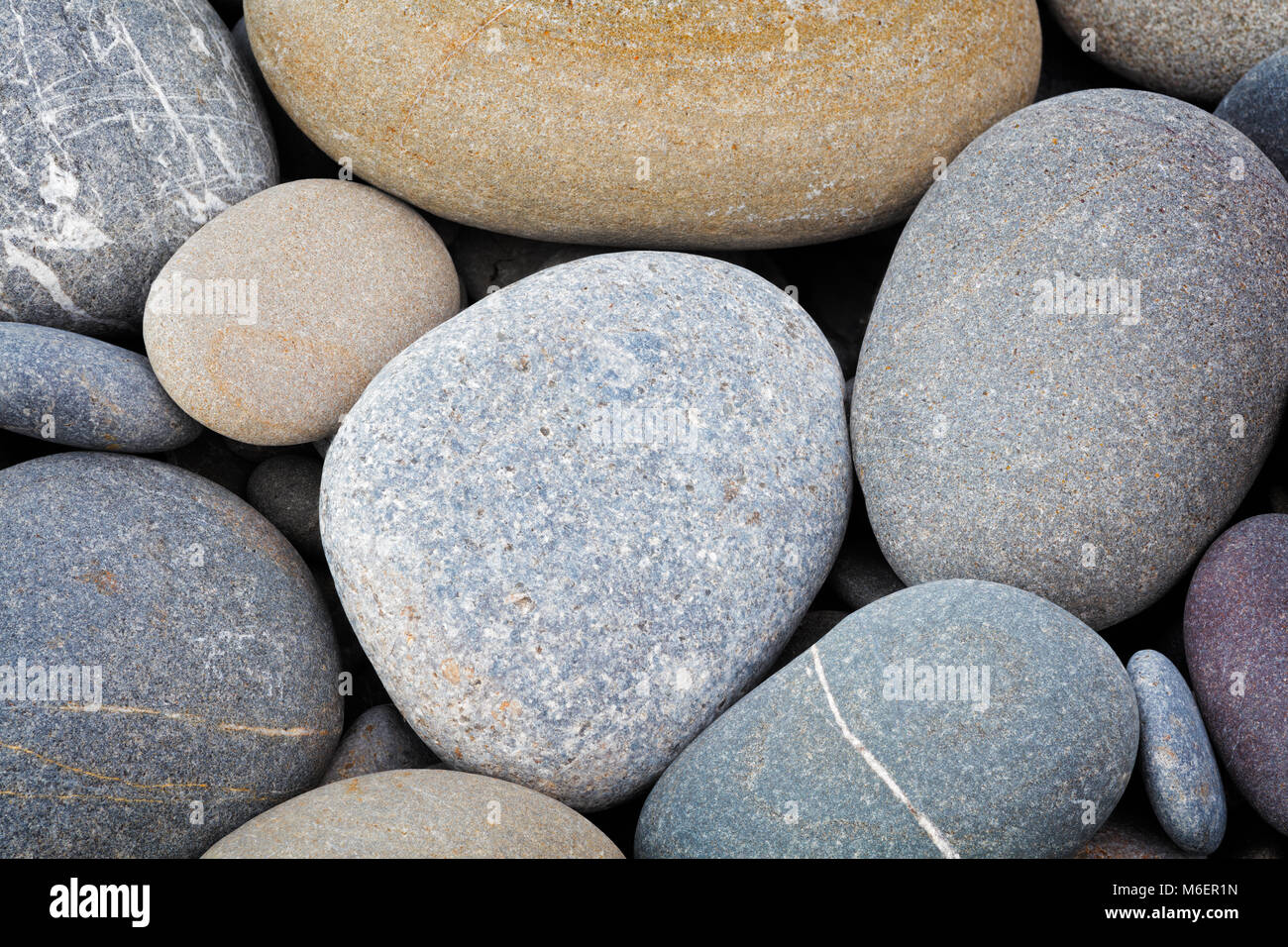 Abstract round sea pebble stones texture background Stock Photo - Alamy