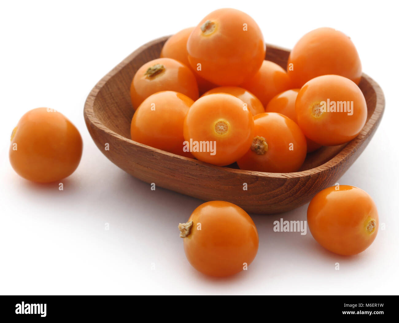 Fresh edible physalis over white background Stock Photo - Alamy