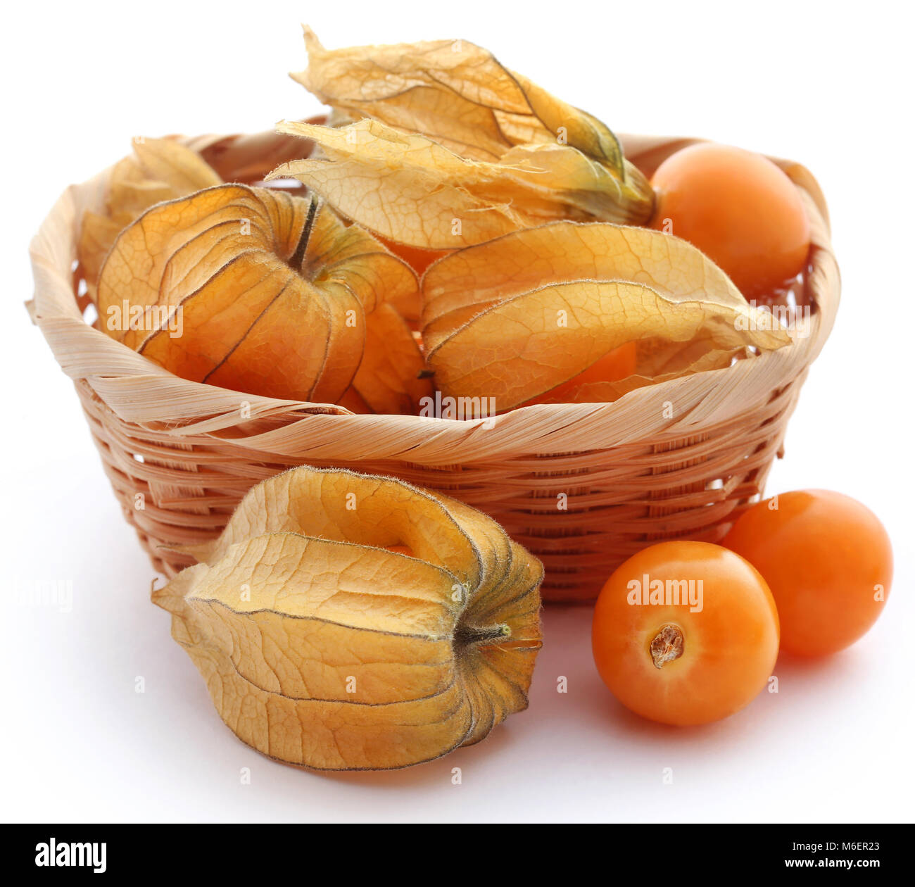 Fresh edible physalis over white background Stock Photo - Alamy