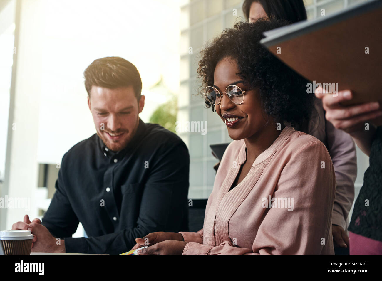 Smiling group diverse office hi-res stock photography and images - Alamy