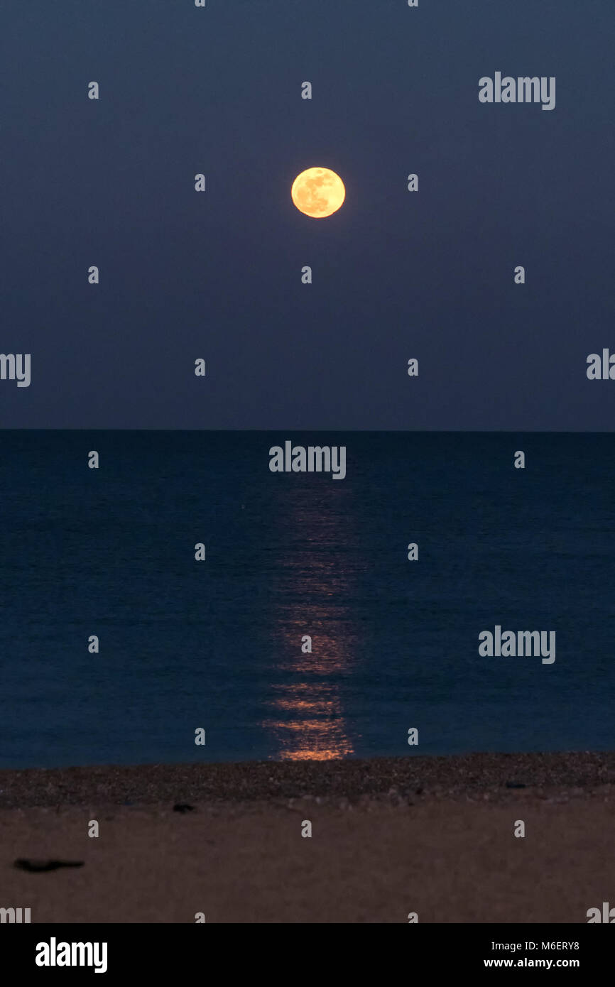 The supermoon over the Mediterranean Sea in Corigliano Calabro, Italy ...