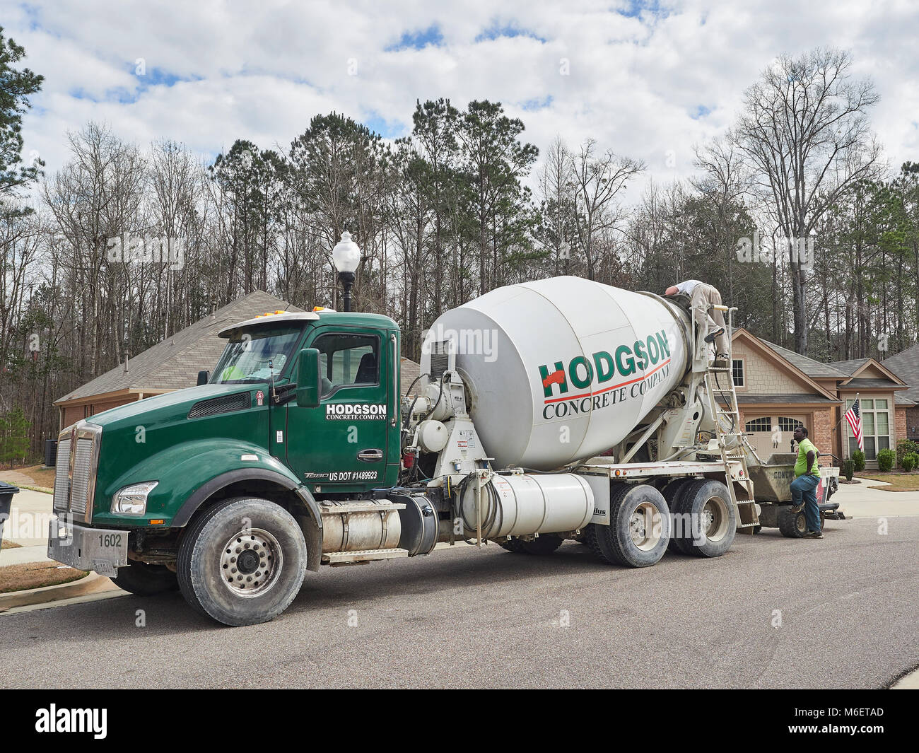 Hodgson concrete truck delivering concrete to a residential ...