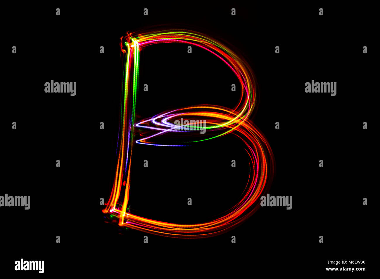 Word writing from light on the black background Stock Photo - Alamy