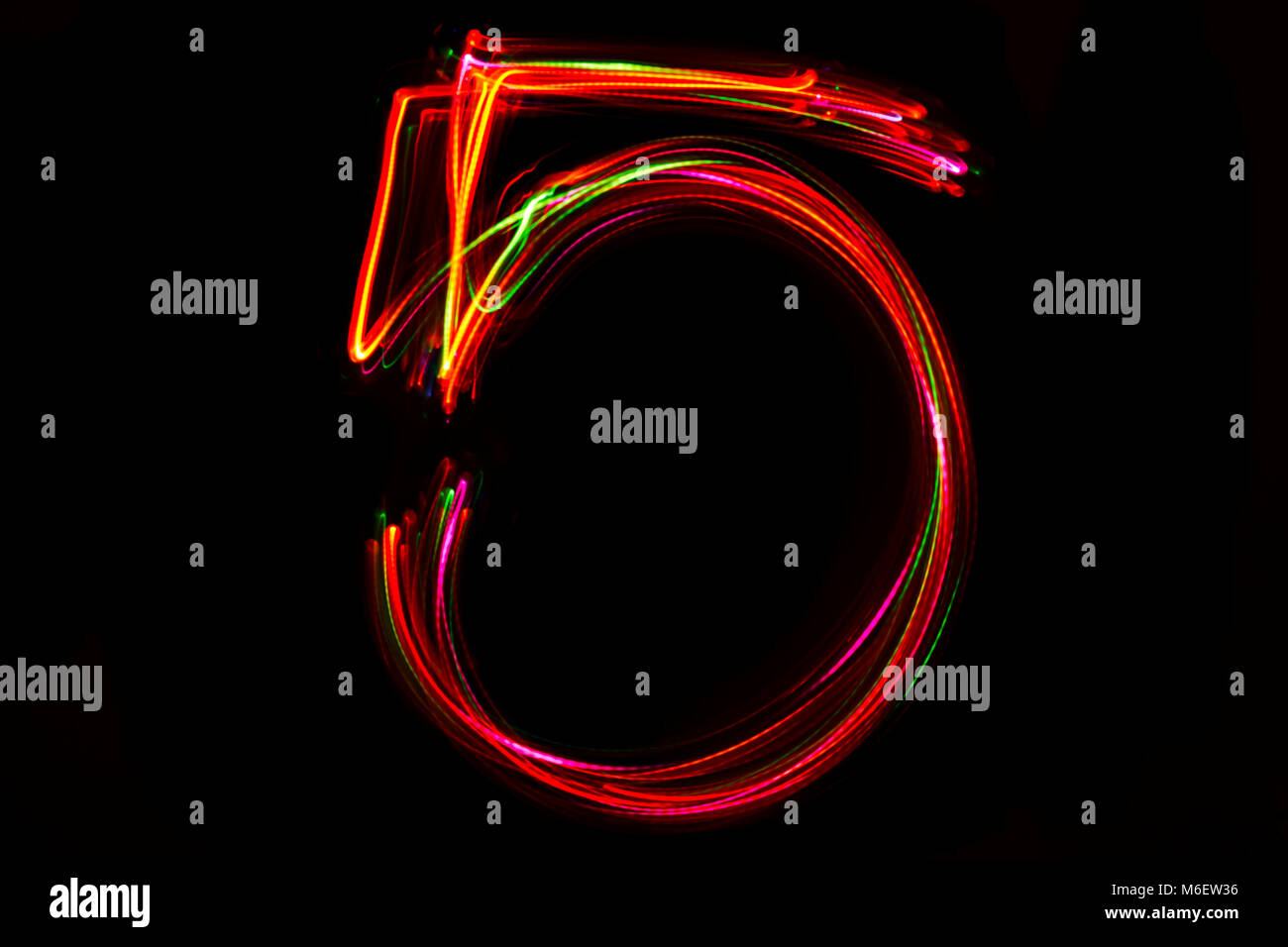 Blurred word writing from light on the black background Stock Photo - Alamy