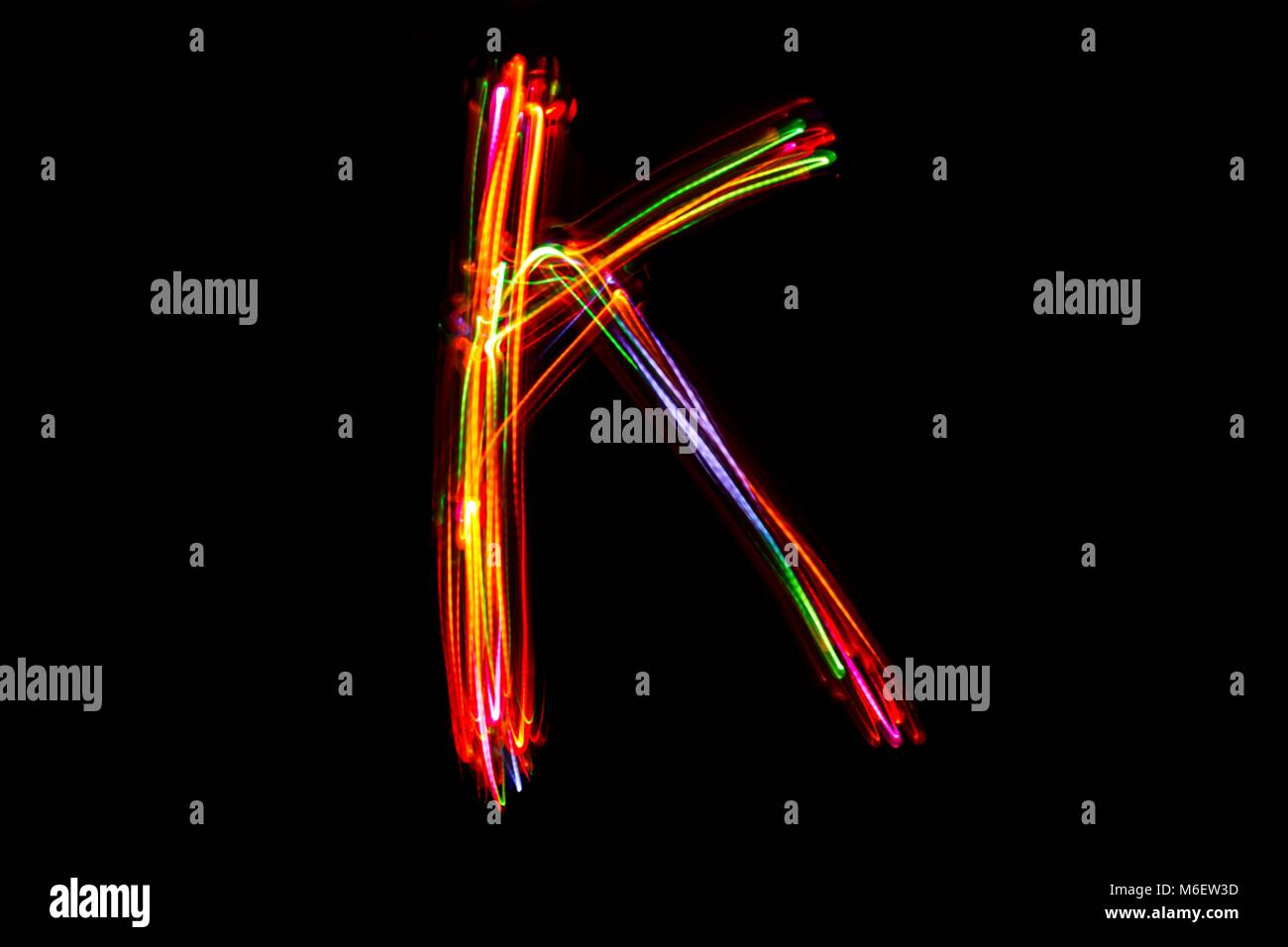 Word writing from light on the black background Stock Photo - Alamy