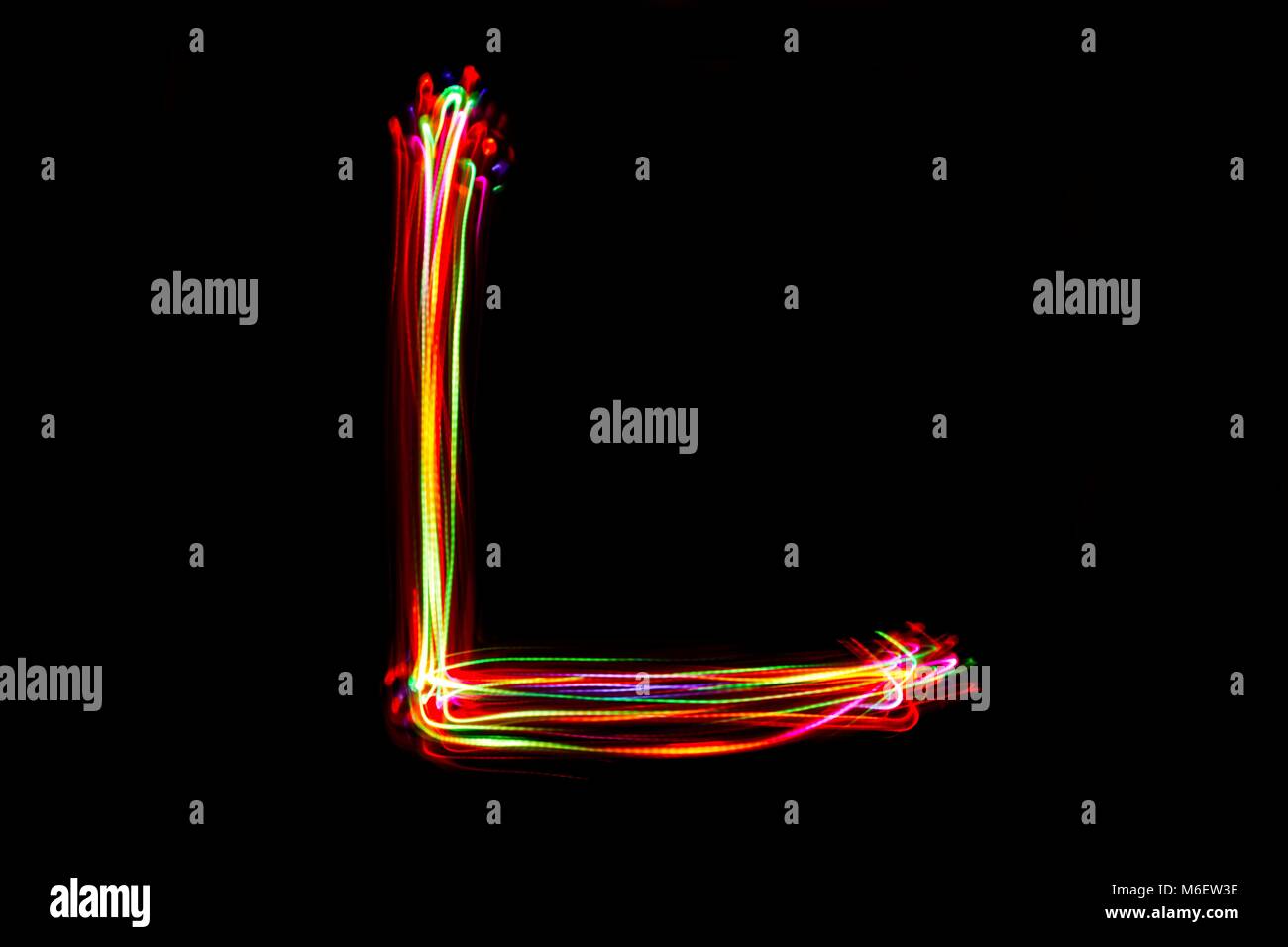 Word writing from light on the black background Stock Photo - Alamy