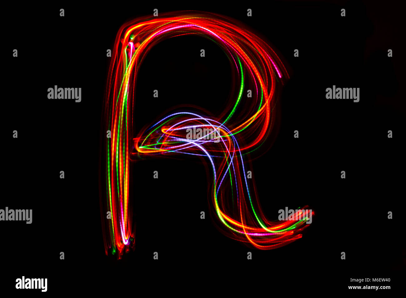 Word writing from light on the black background Stock Photo - Alamy