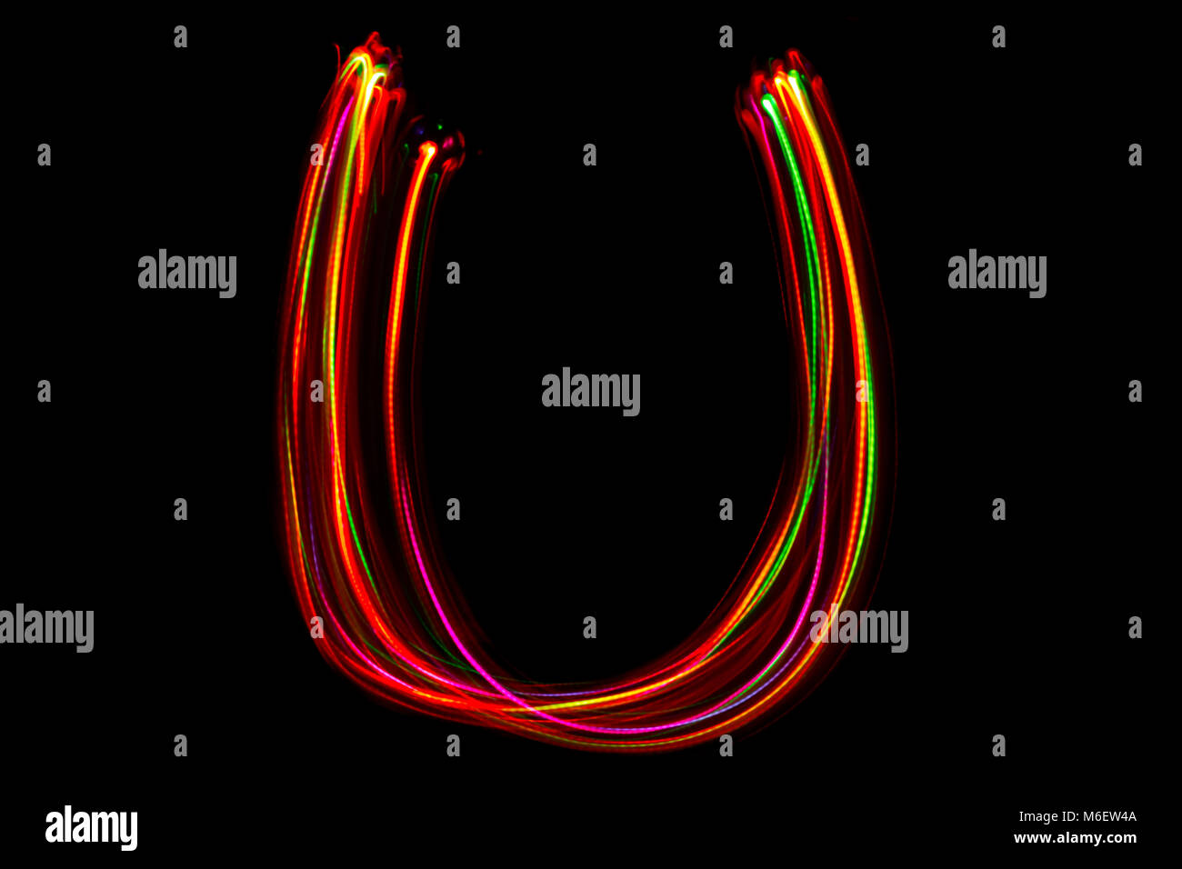 Word writing from light on the black background Stock Photo - Alamy