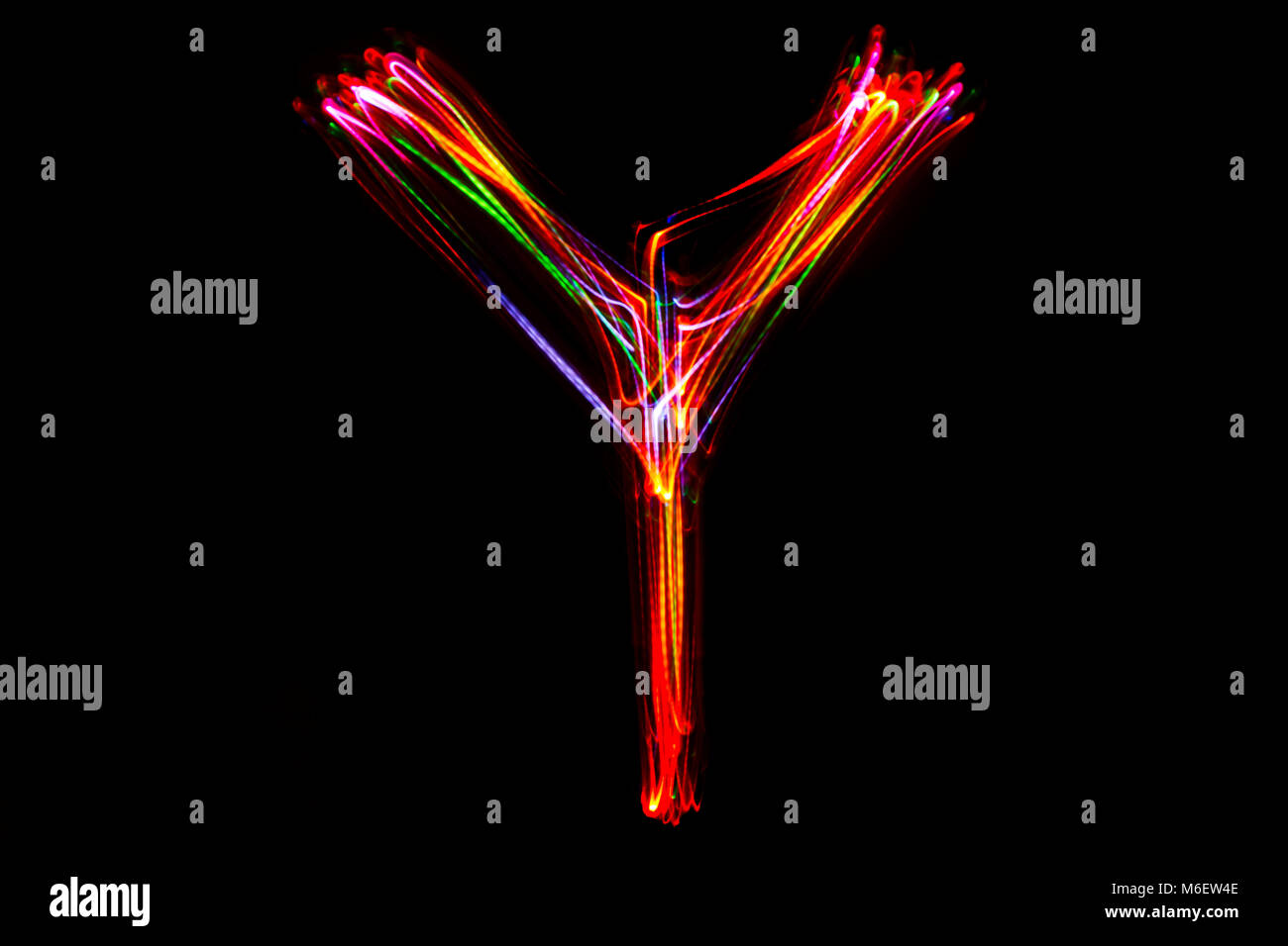 Blurred word writing from light on the black background Stock Photo - Alamy