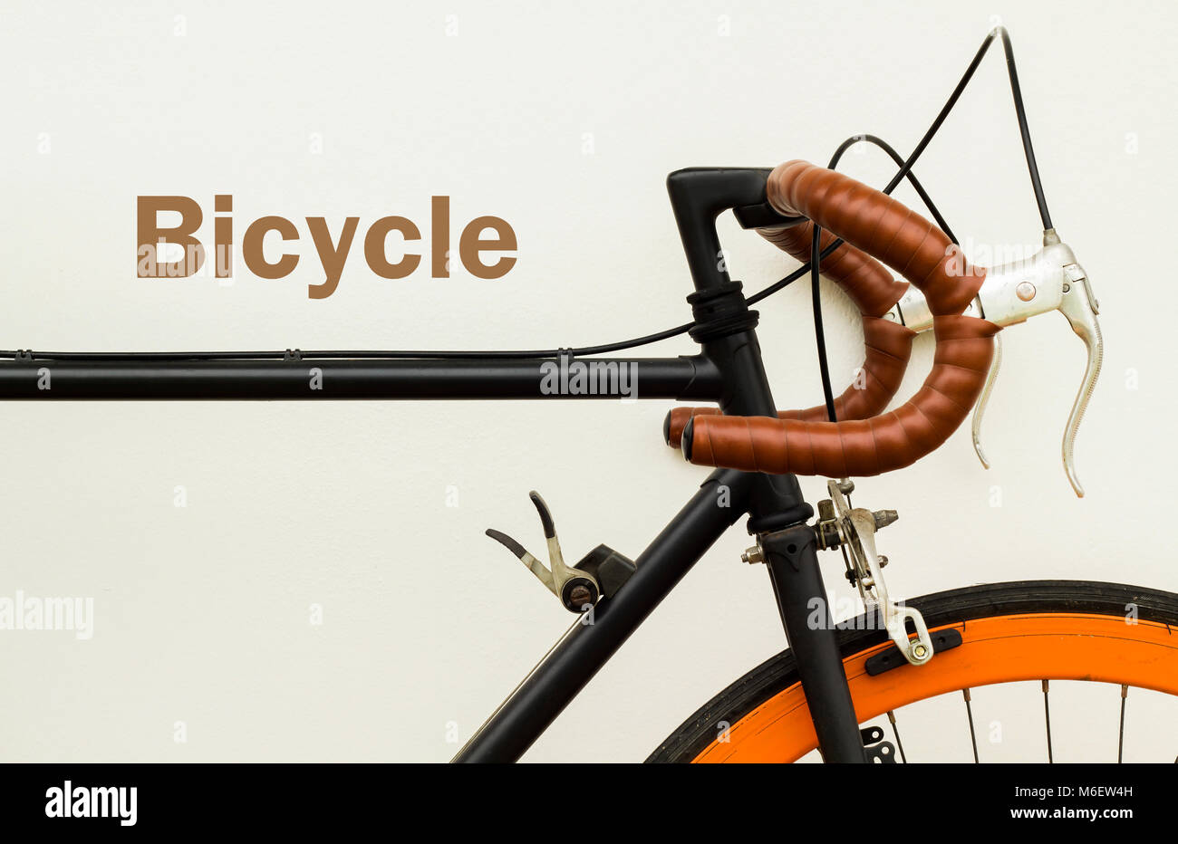 Some of old bicycle on white wall with word on space left side Stock ...