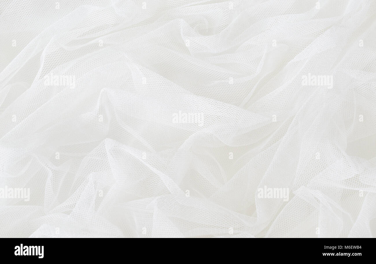 White tulle drapery for background Stock Photo - Alamy