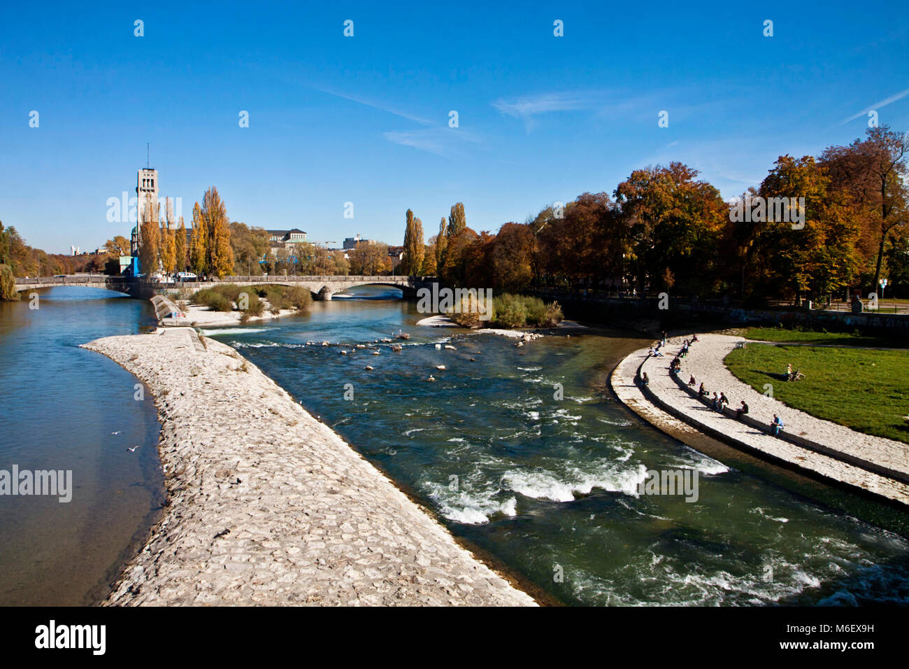 Beautiful panoramic autumnal view of the blue waters of Isar river in ...