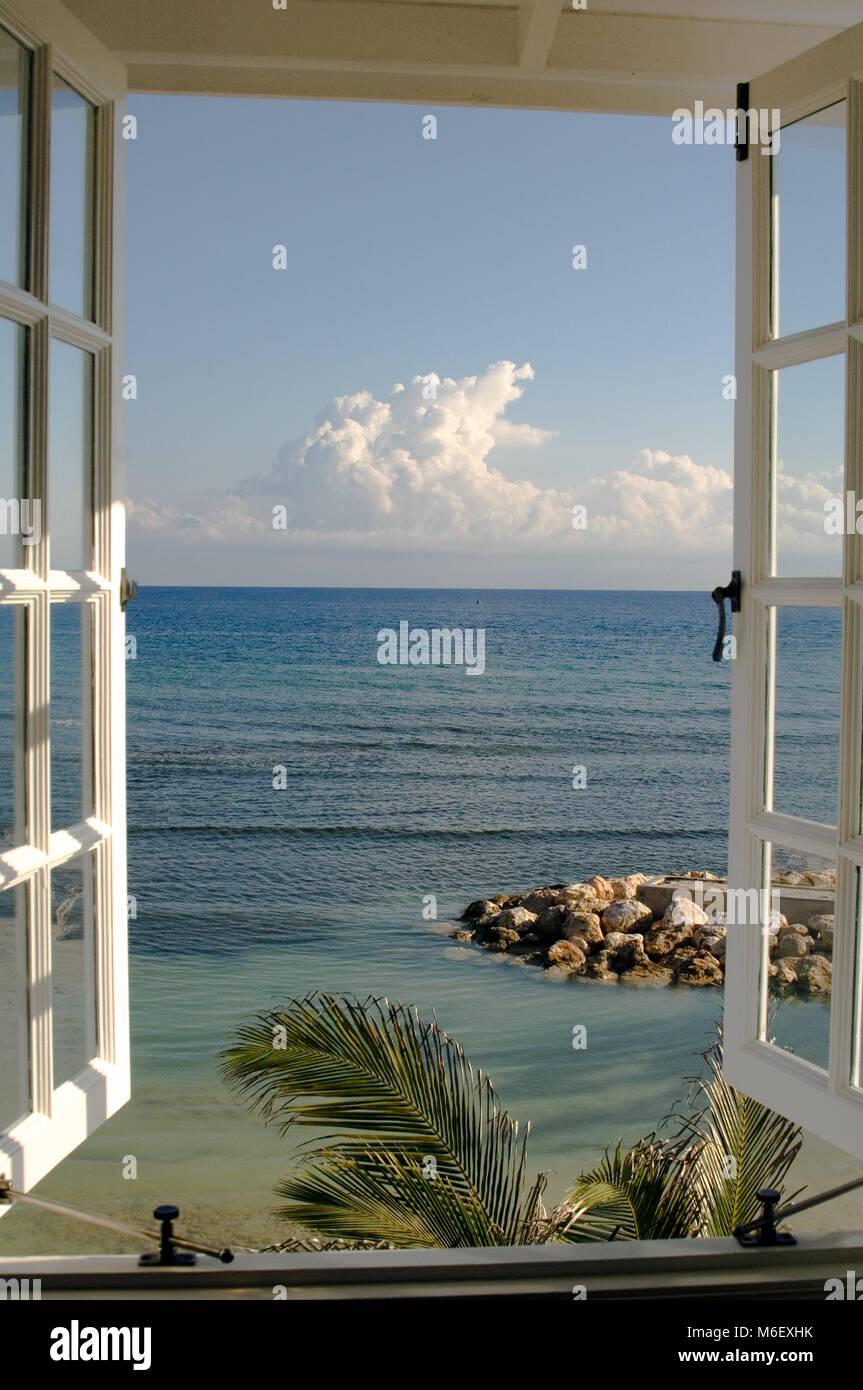 Looking through a window at the beach Stock Photo - Alamy