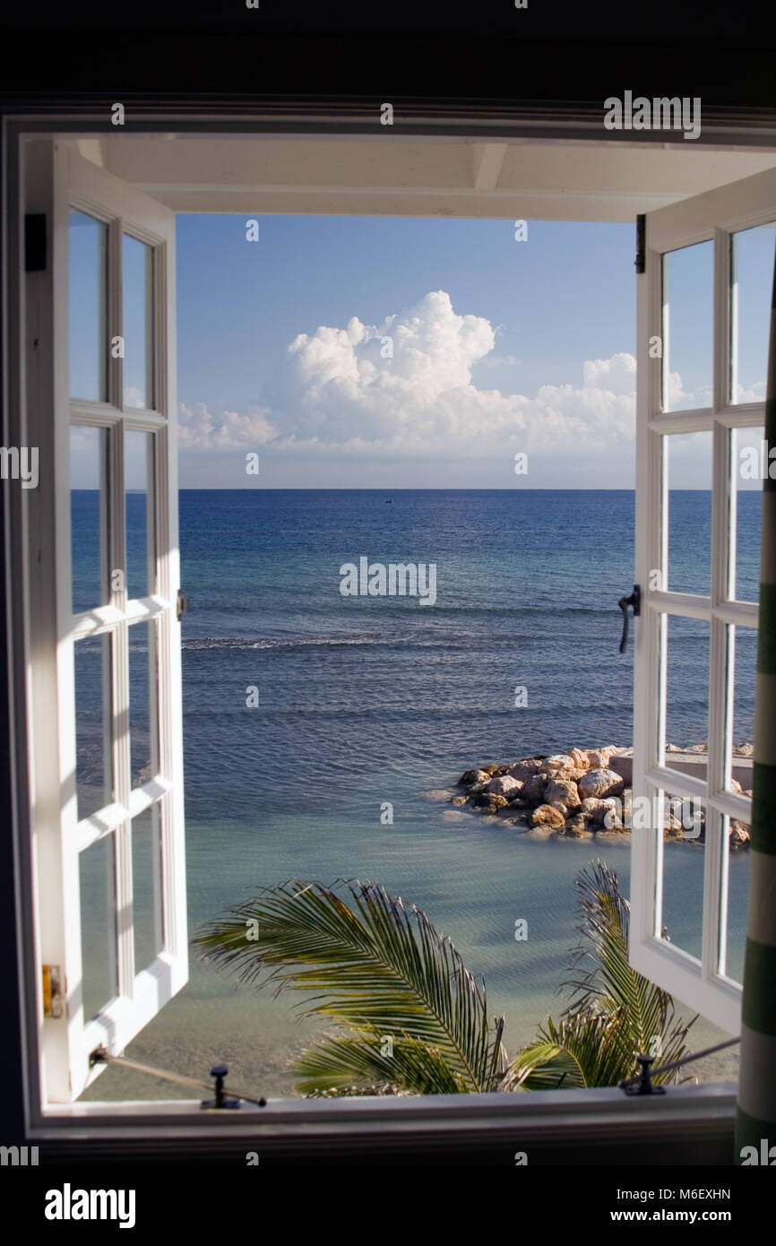 Looking through a window at the beach Stock Photo - Alamy