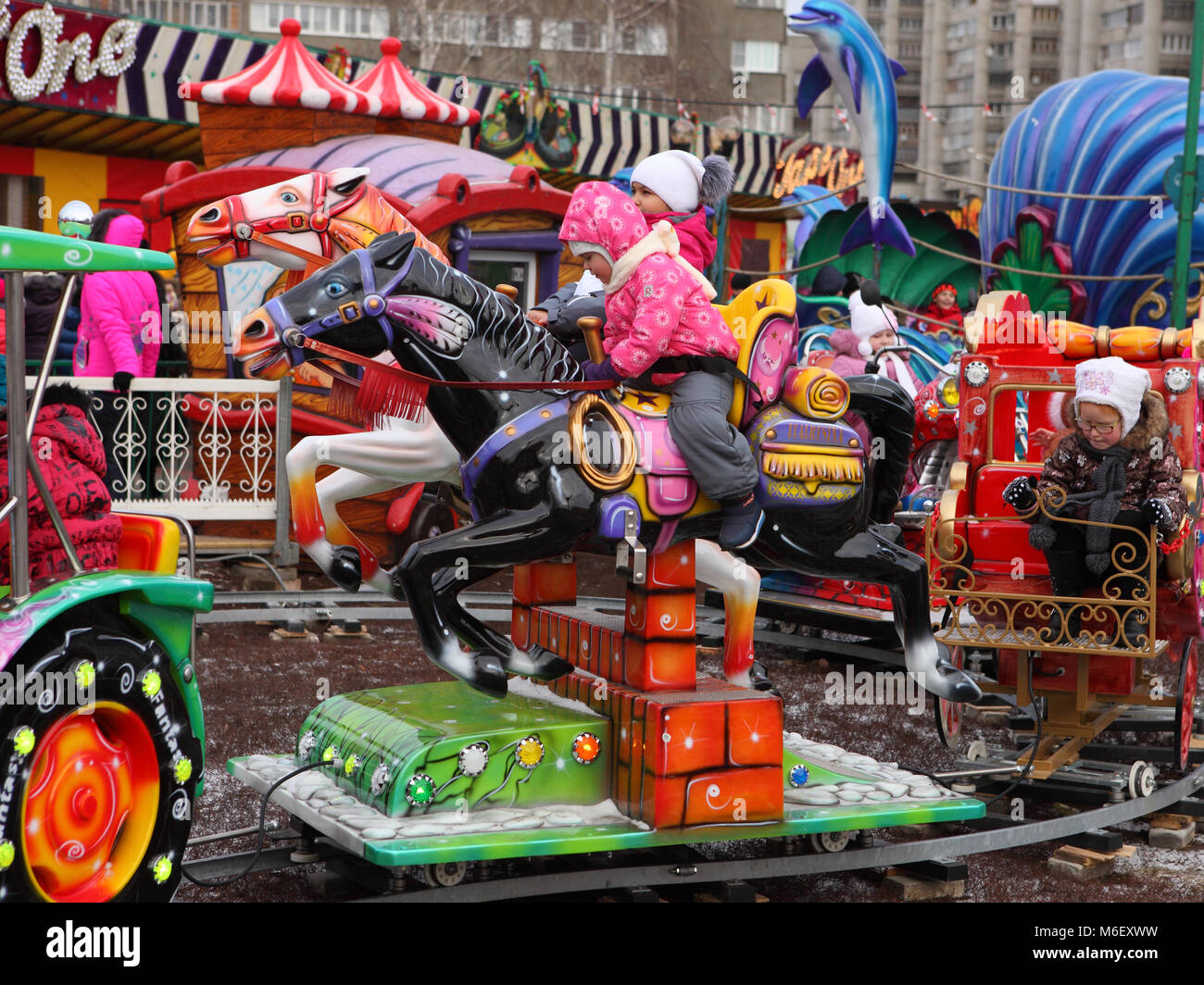 Child amusement park carousel hi-res stock photography and images - Alamy