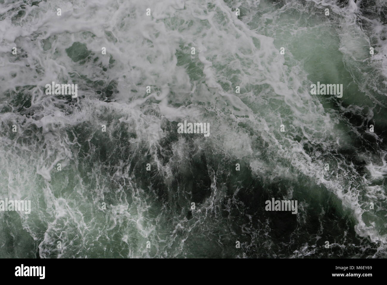 Big water splash seen from above a boat Stock Photo - Alamy