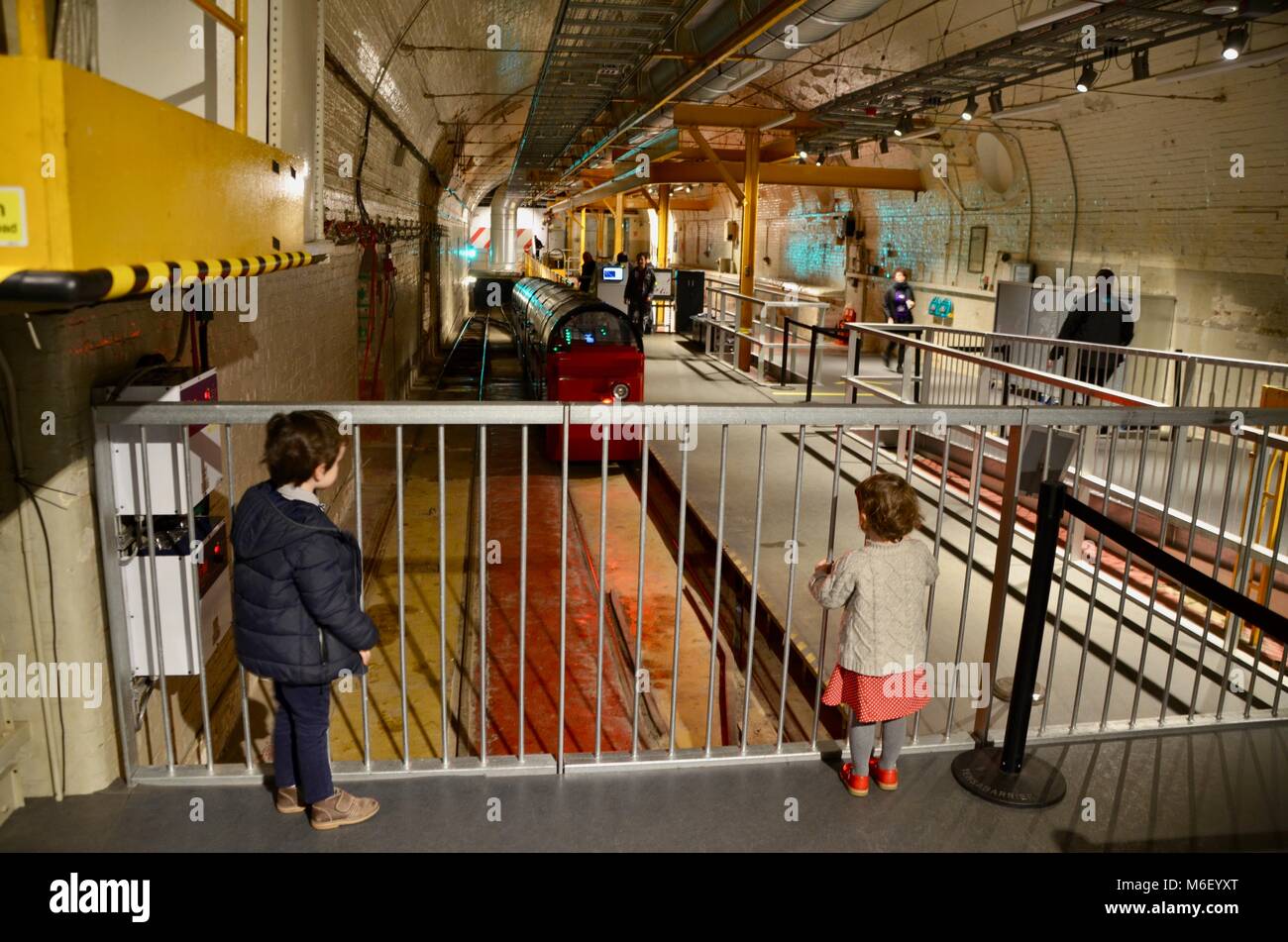 two children watch the train at postal museum mount pleasant north ...
