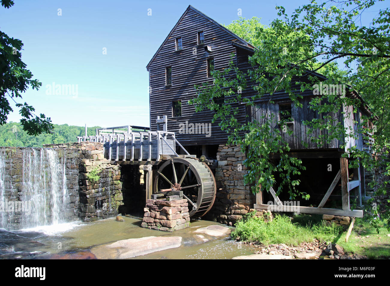 Old grain mill with waterwheel hi-res stock photography and images - Alamy