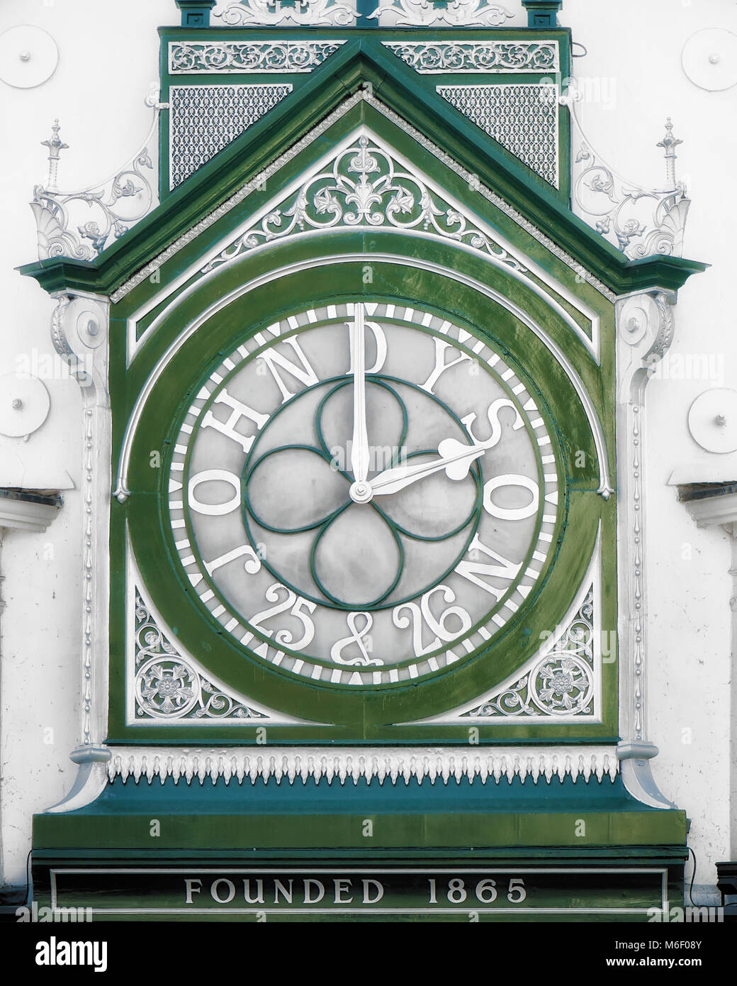 Civic Clock in green Stock Photo - Alamy