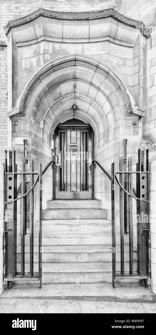 Gothic cathedral doorway and steps with wrought iron fence Stock Photo ...