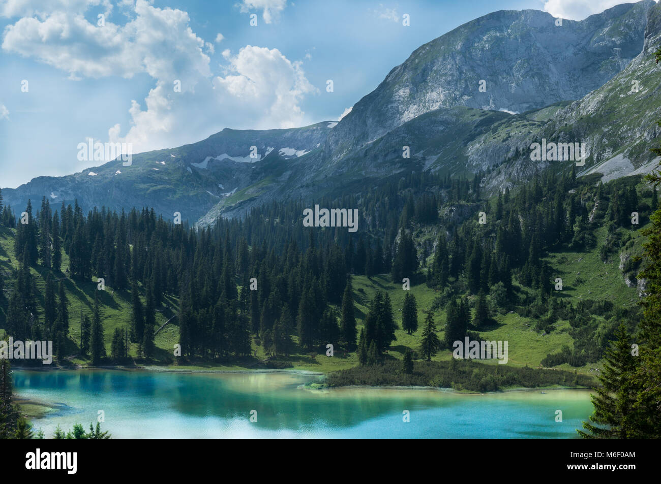 Amazing alpine scenery with vivid turquoise colored lake in foreground ...