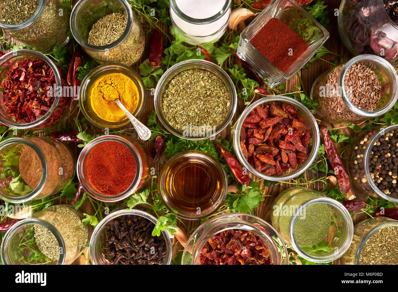 Various spices for dishes on wooden boards, camera from above Stock ...