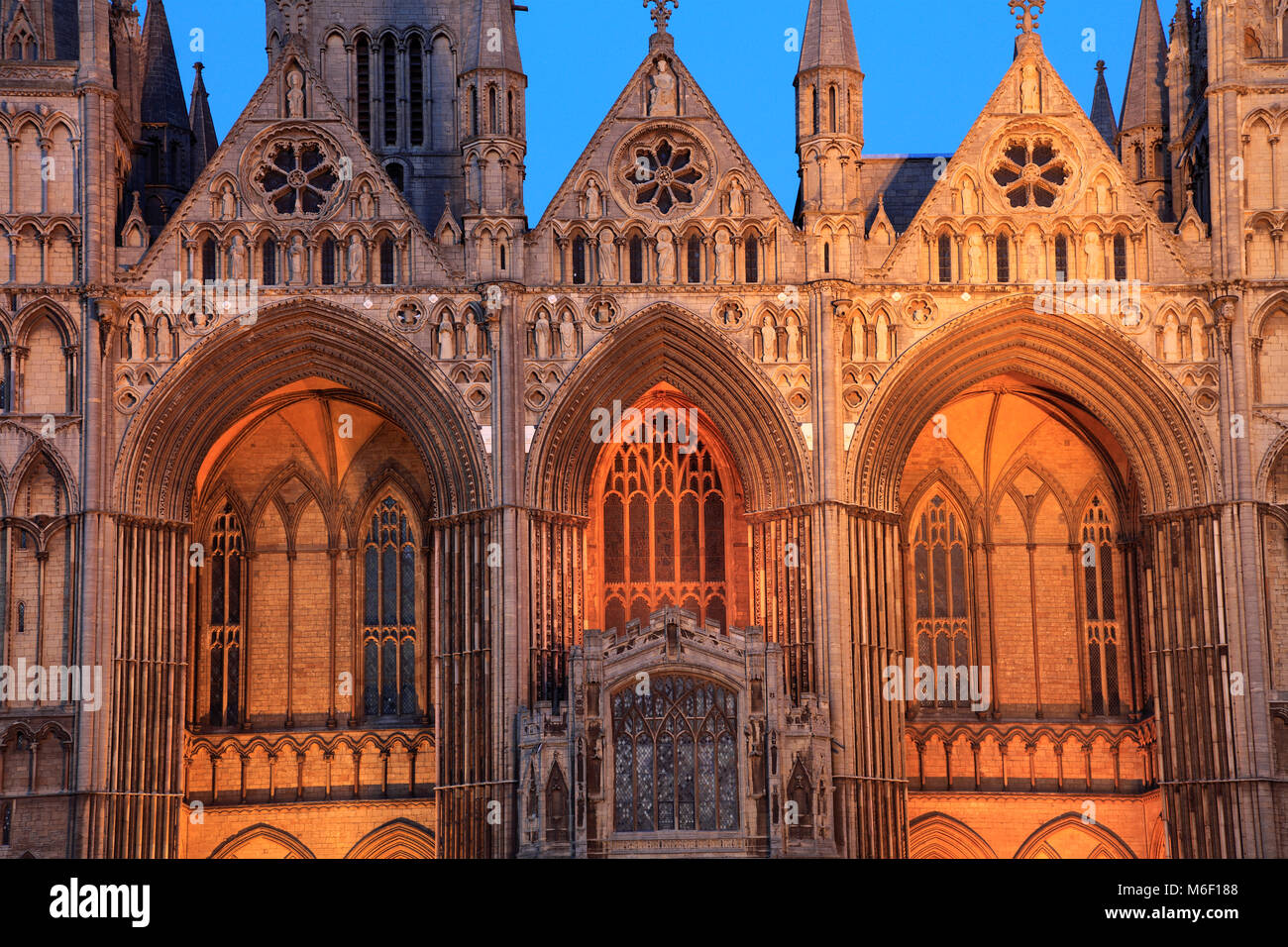 Night view over the West front elevation of Peterborough City Cathedral ...