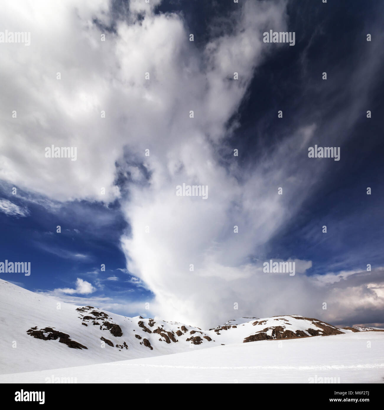 Snowy mountains and sky with clouds at windy day. Turkey, Central ...
