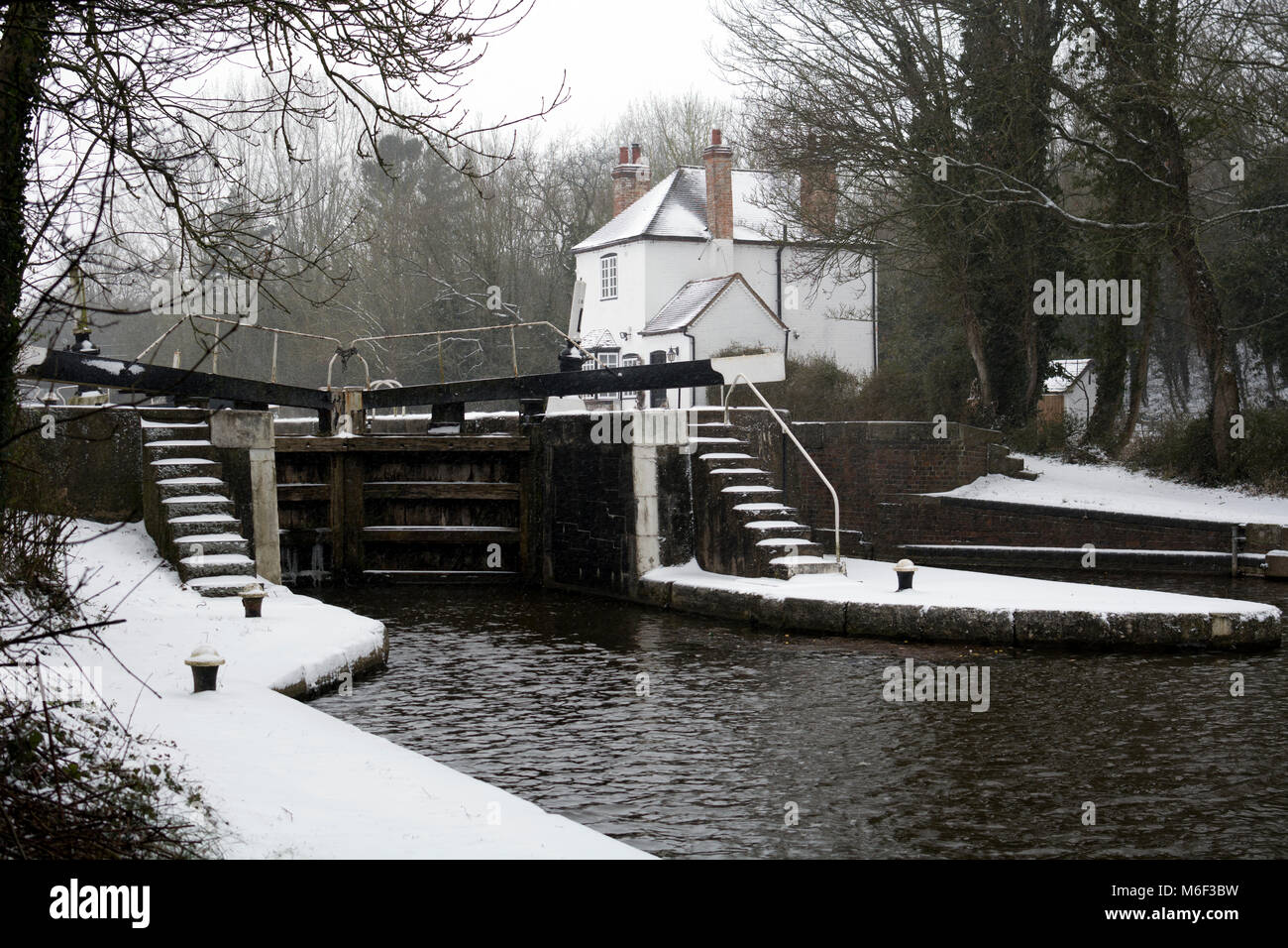 Hatton Bottom Lock and lock cottage in winter, Grand Union Canal ...