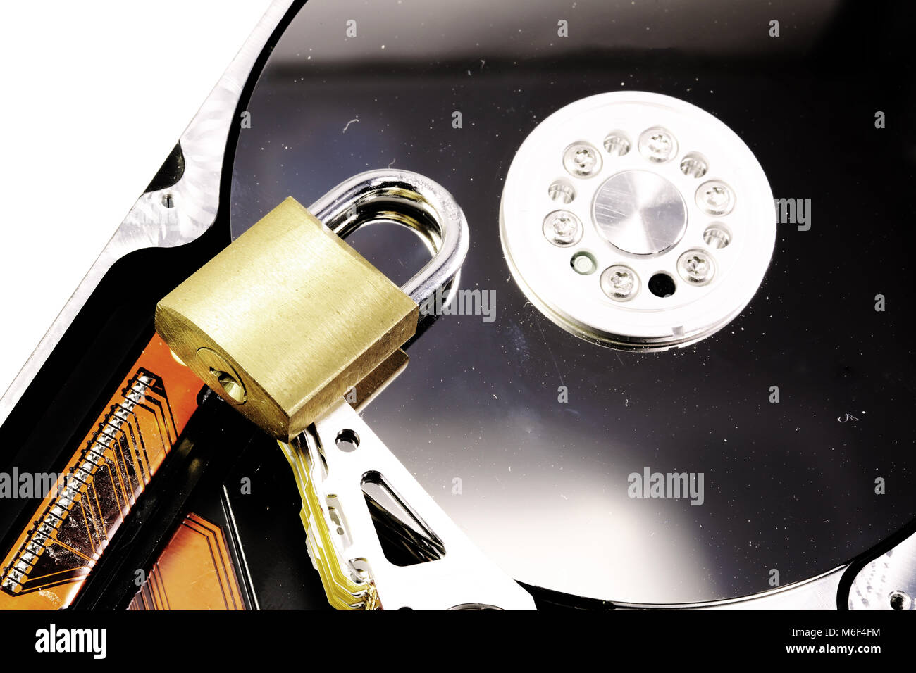 hard disk drive of a computer with a closed padlock as a concept for ...