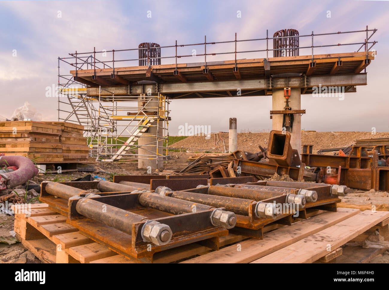 New bridge getting built with a use of a crain Stock Photo - Alamy