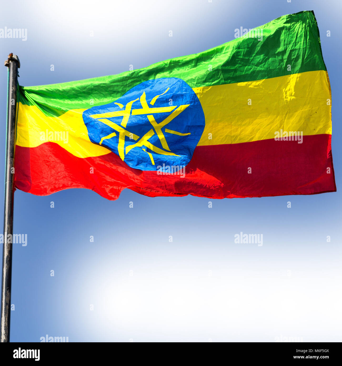 in ethiopia africa the colorful flag waving in the sky Stock Photo - Alamy
