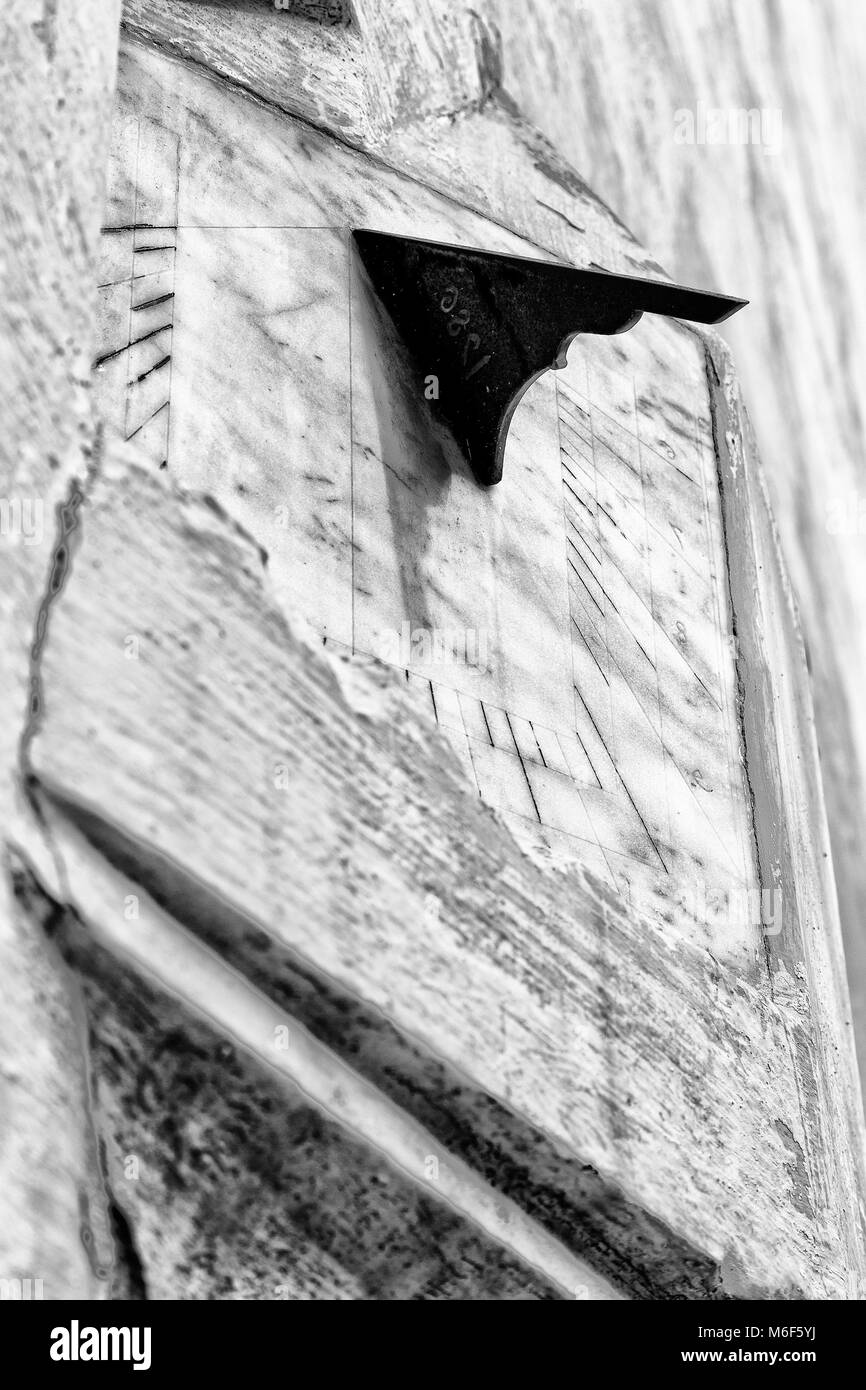 and the gnomon in the antique broken wall Stock Photo - Alamy