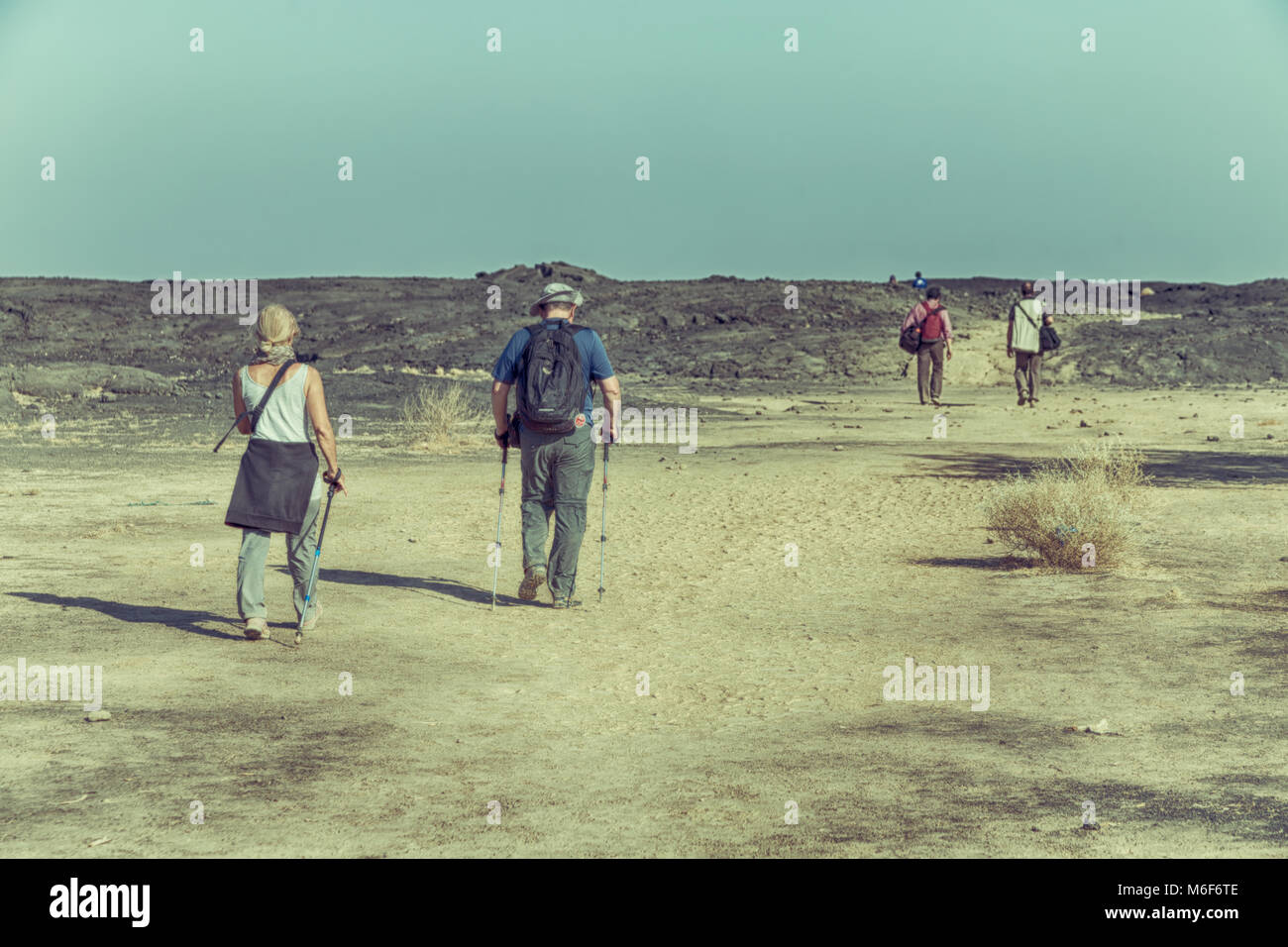 in danakil ethiopia africa the old backpacker people walking in the ...