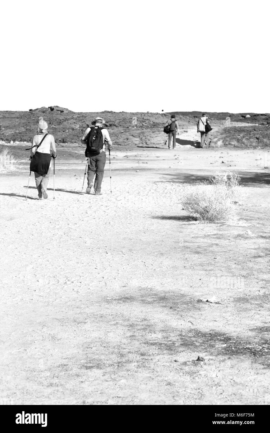 in danakil ethiopia africa the old backpacker people walking in the ...