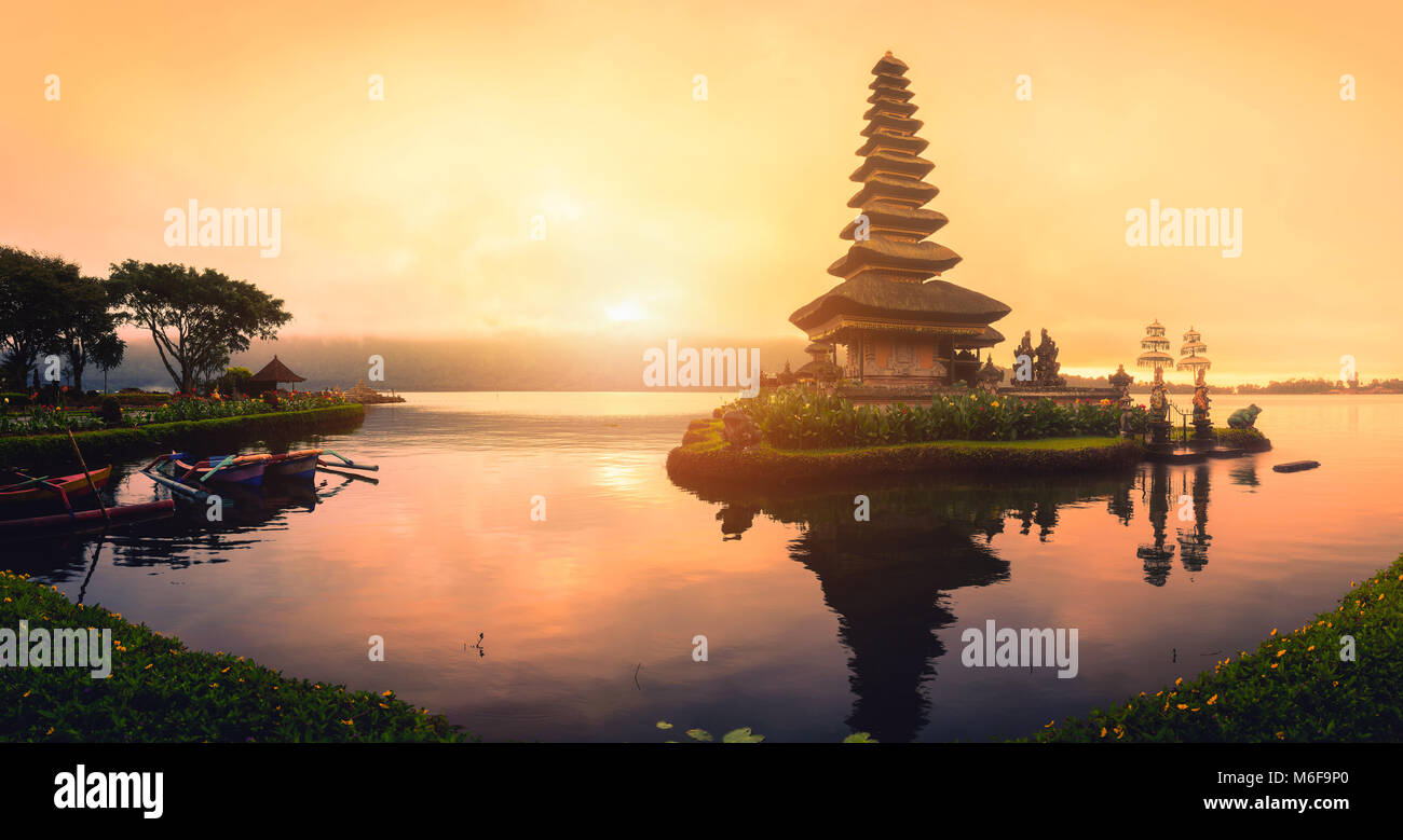 Pura Ulun Danu Bratan, Hindu temple with boat on Bratan lake landscape at sunrise in Bali ...