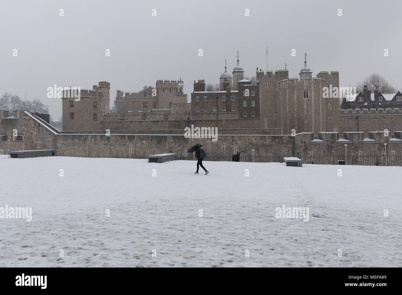 London, UK. 2nd March 2018. A person with an umbrella walks past the ...