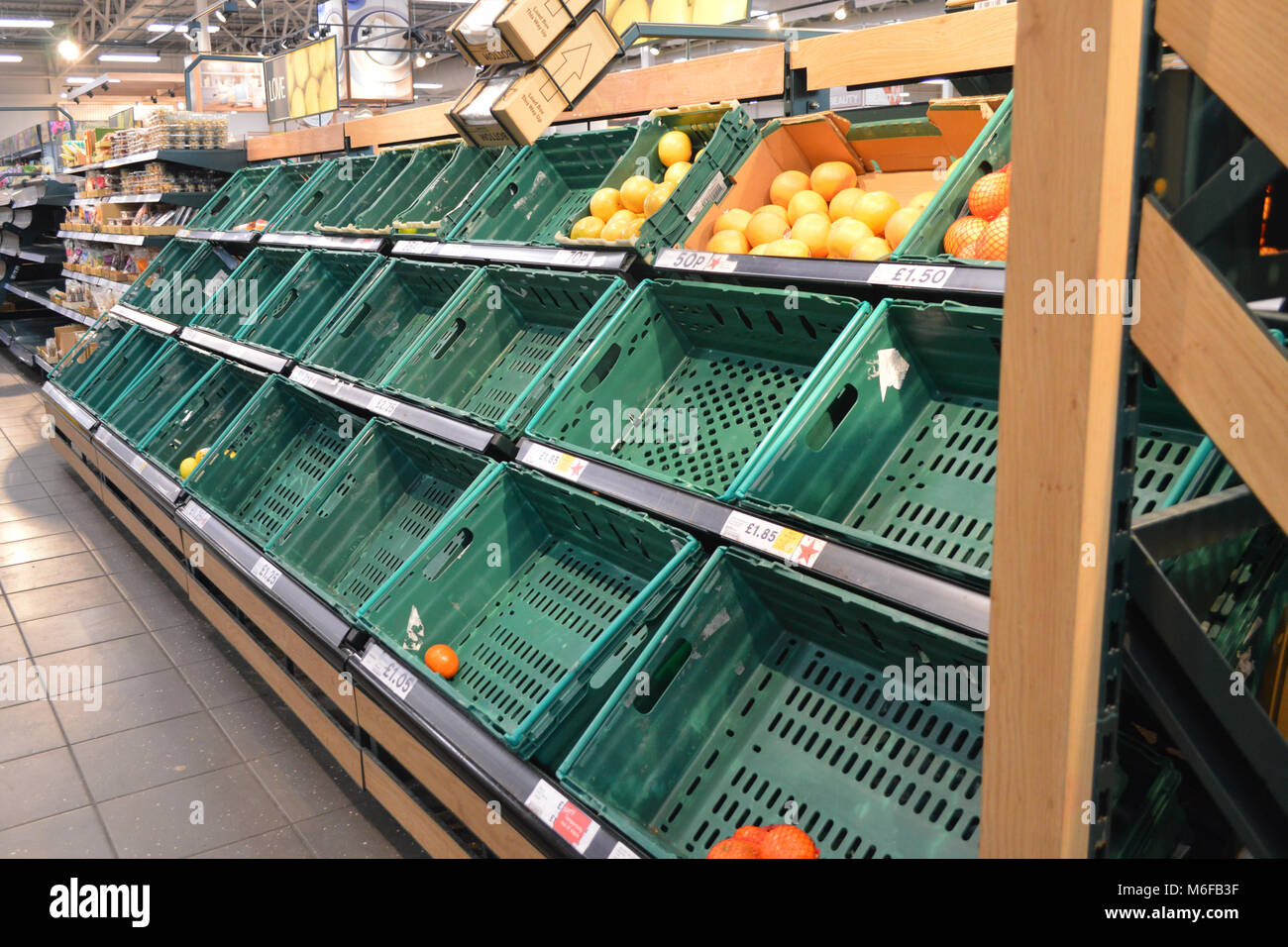 Post snow, low stocks on supermarket shelves in Tesco Fforestfach Stock ...