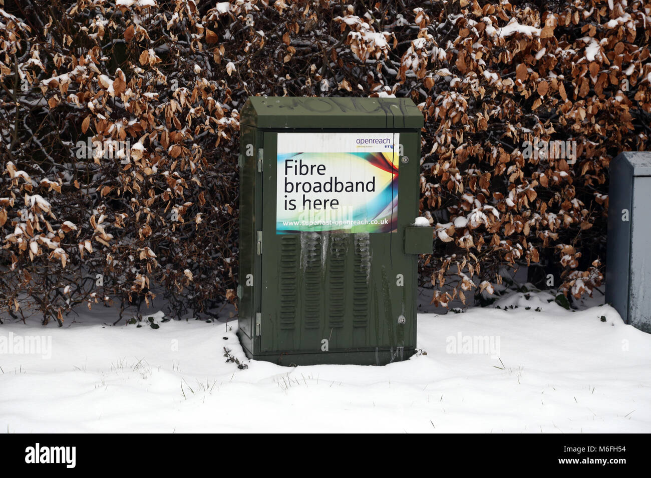 A BT Fibre Broadband communications box in the snow in Peterborough ...