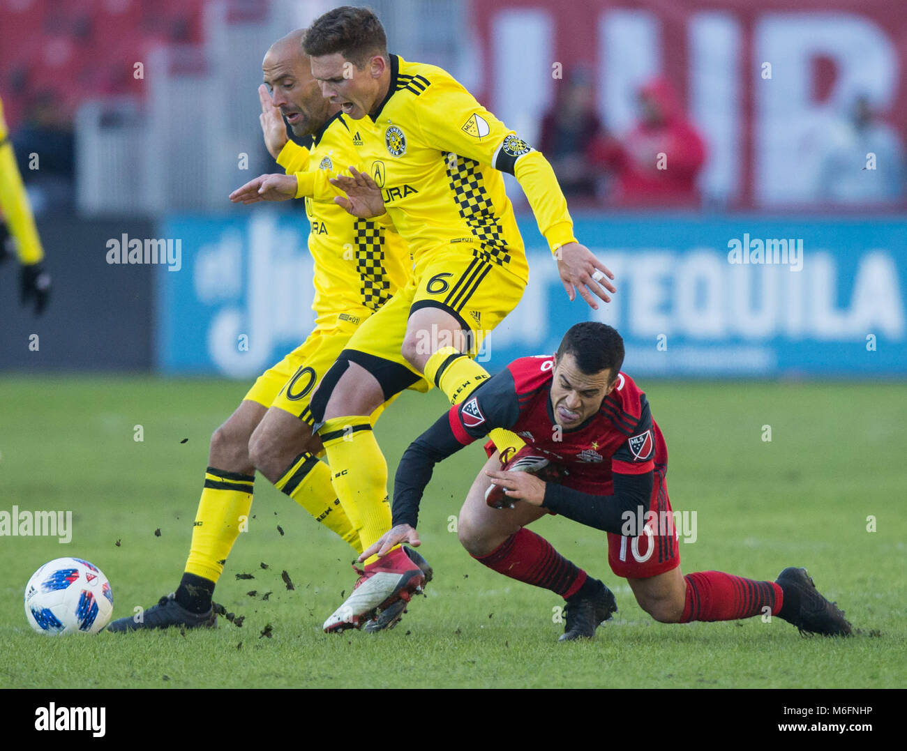 Toronto, Canada. 3rd Mar, 2018. Will Trapp (2nd R) of Columbus Crew SC ...