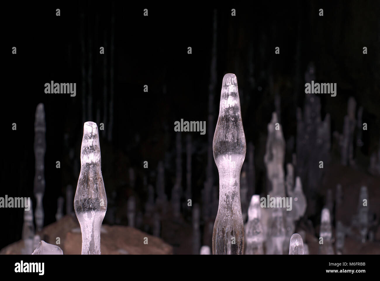 ice formations in a dark underground cave Stock Photo - Alamy
