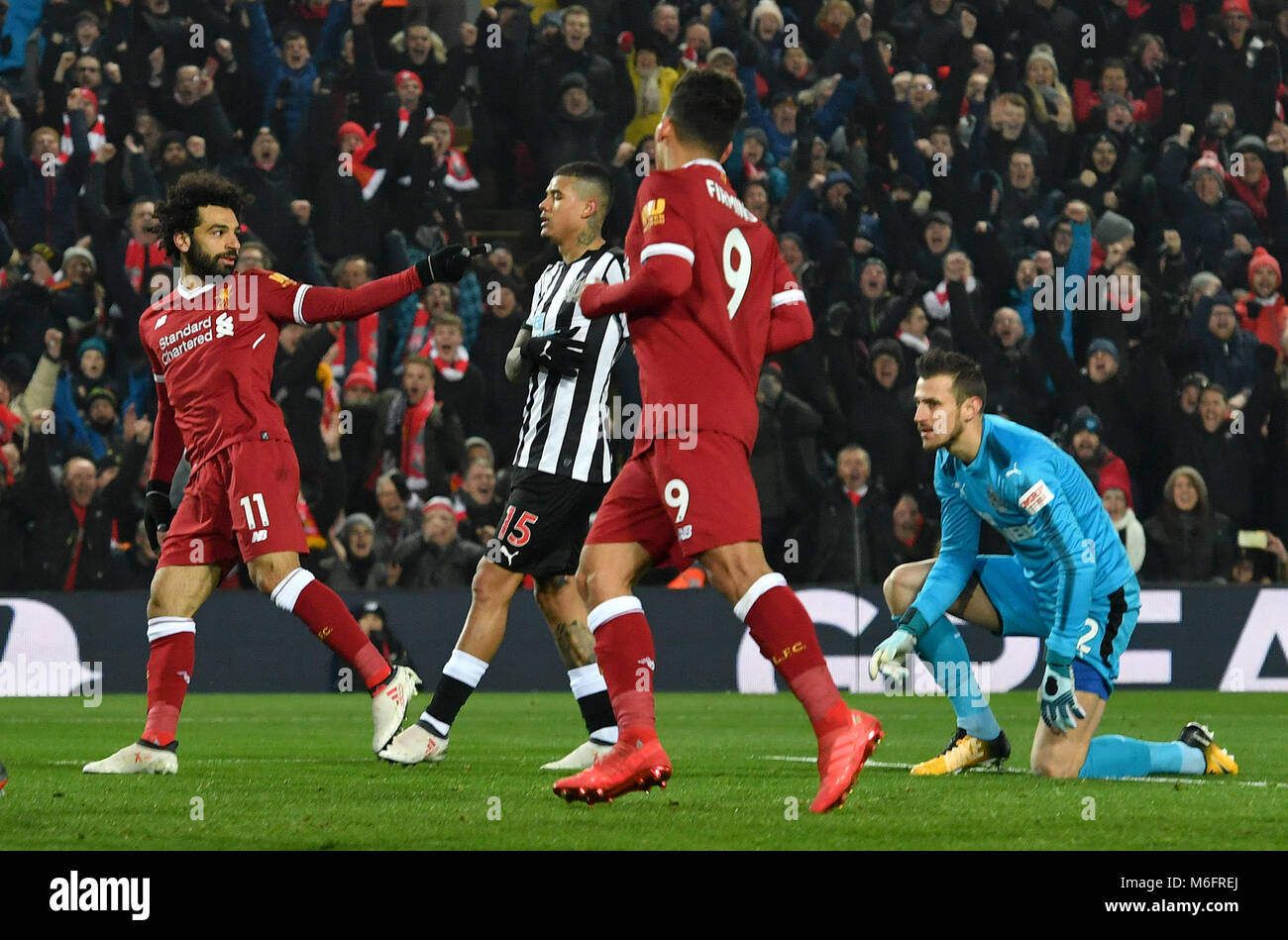 Liverpool's Mohamed Salah celebrates scoring his side's first goal of ...