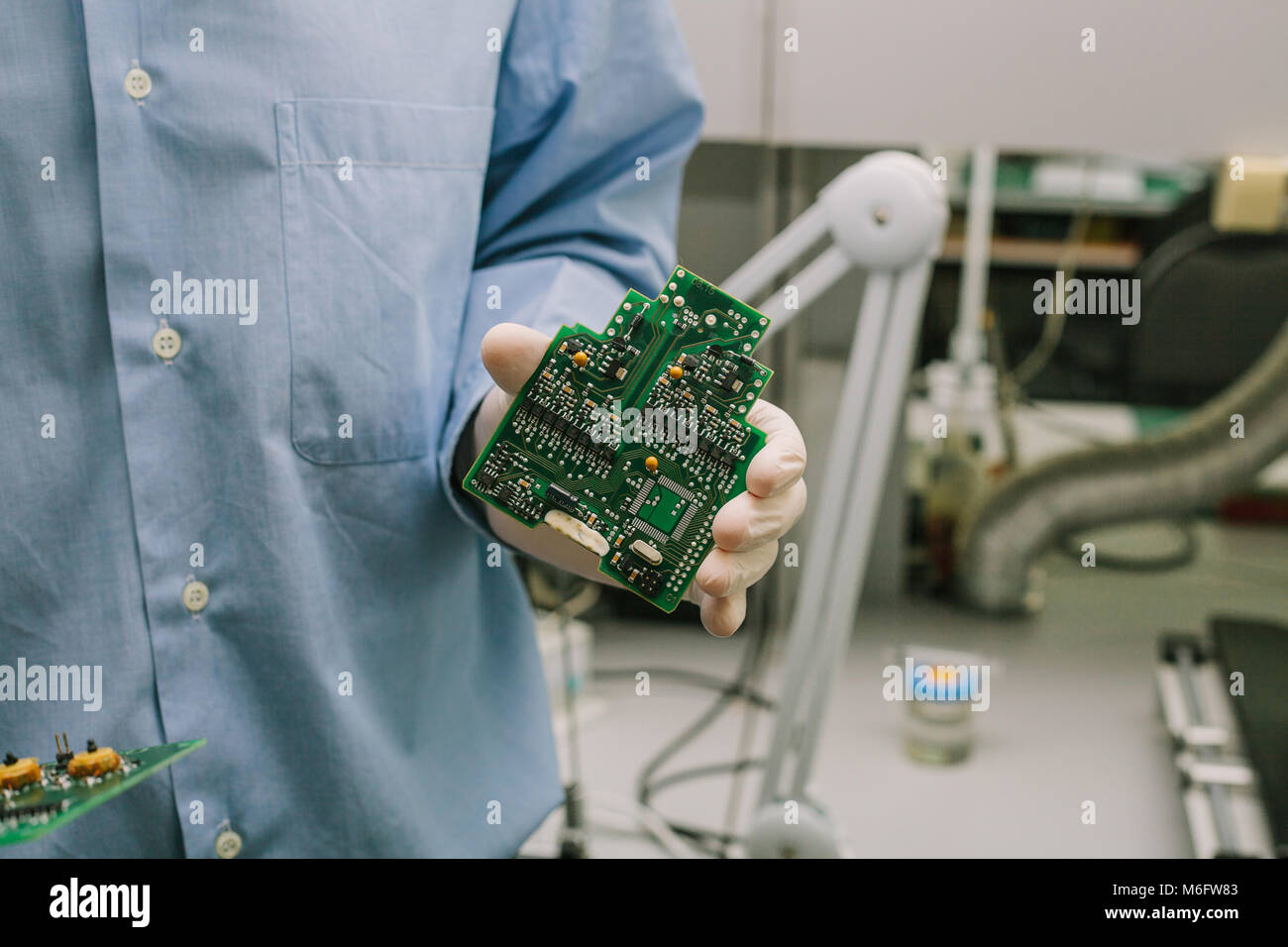 Man with computer circuit board hi-res stock photography and images - Alamy