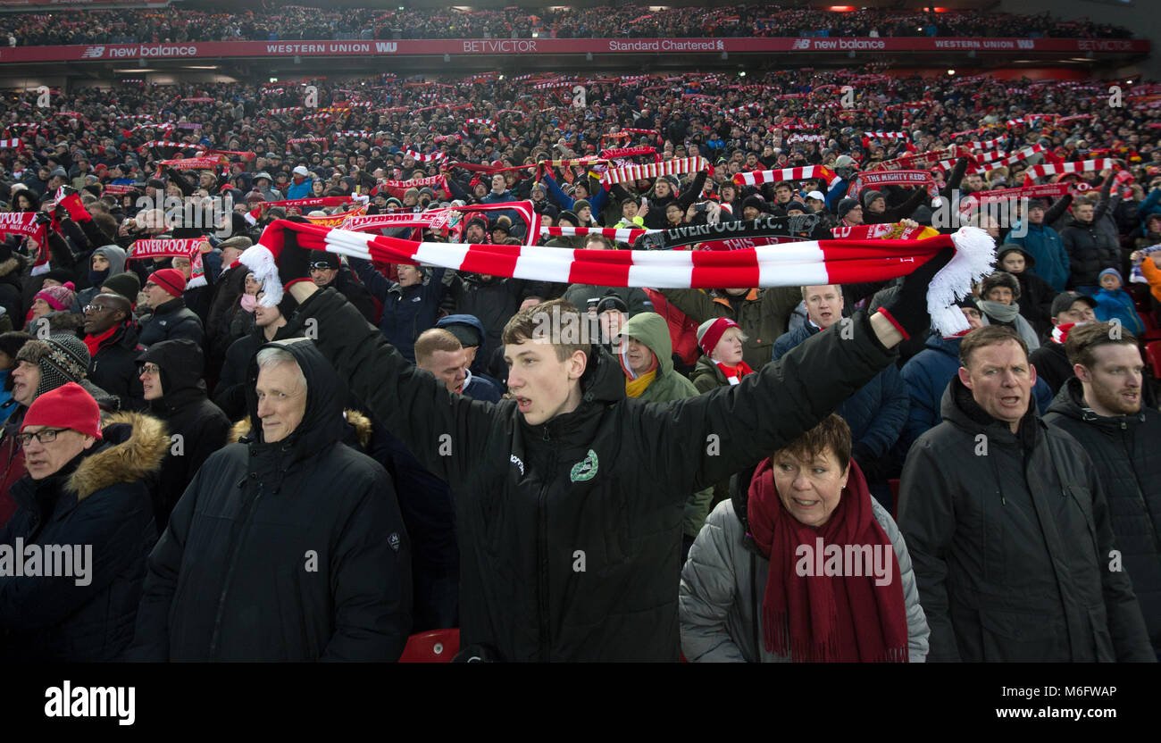 Liverpool fans in the stands celebrate after the final whistle during ...