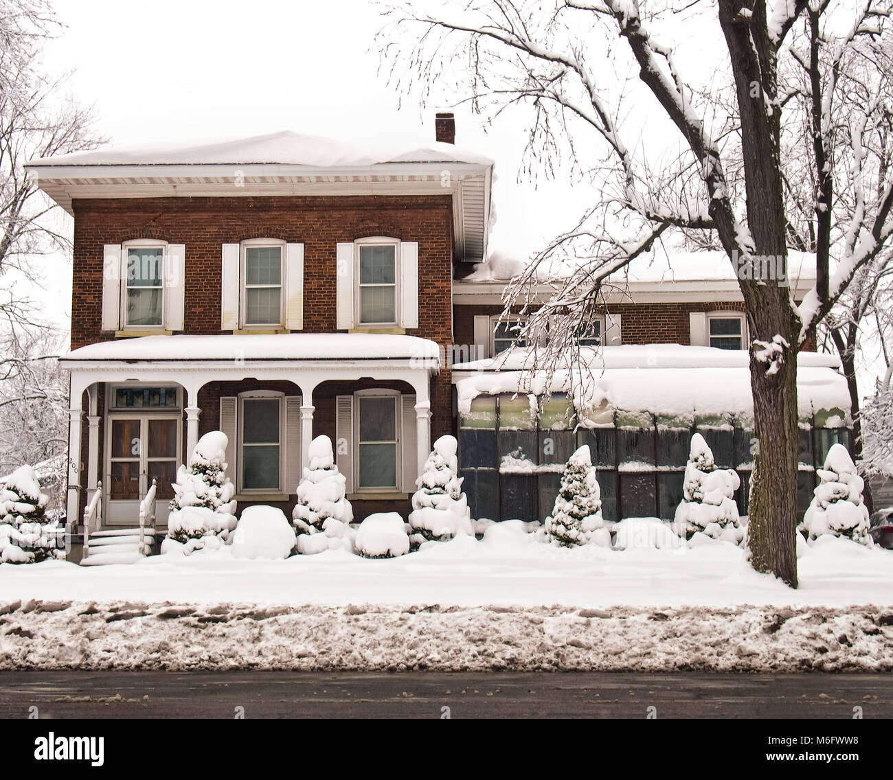 Classic style home in wintertime Stock Photo - Alamy